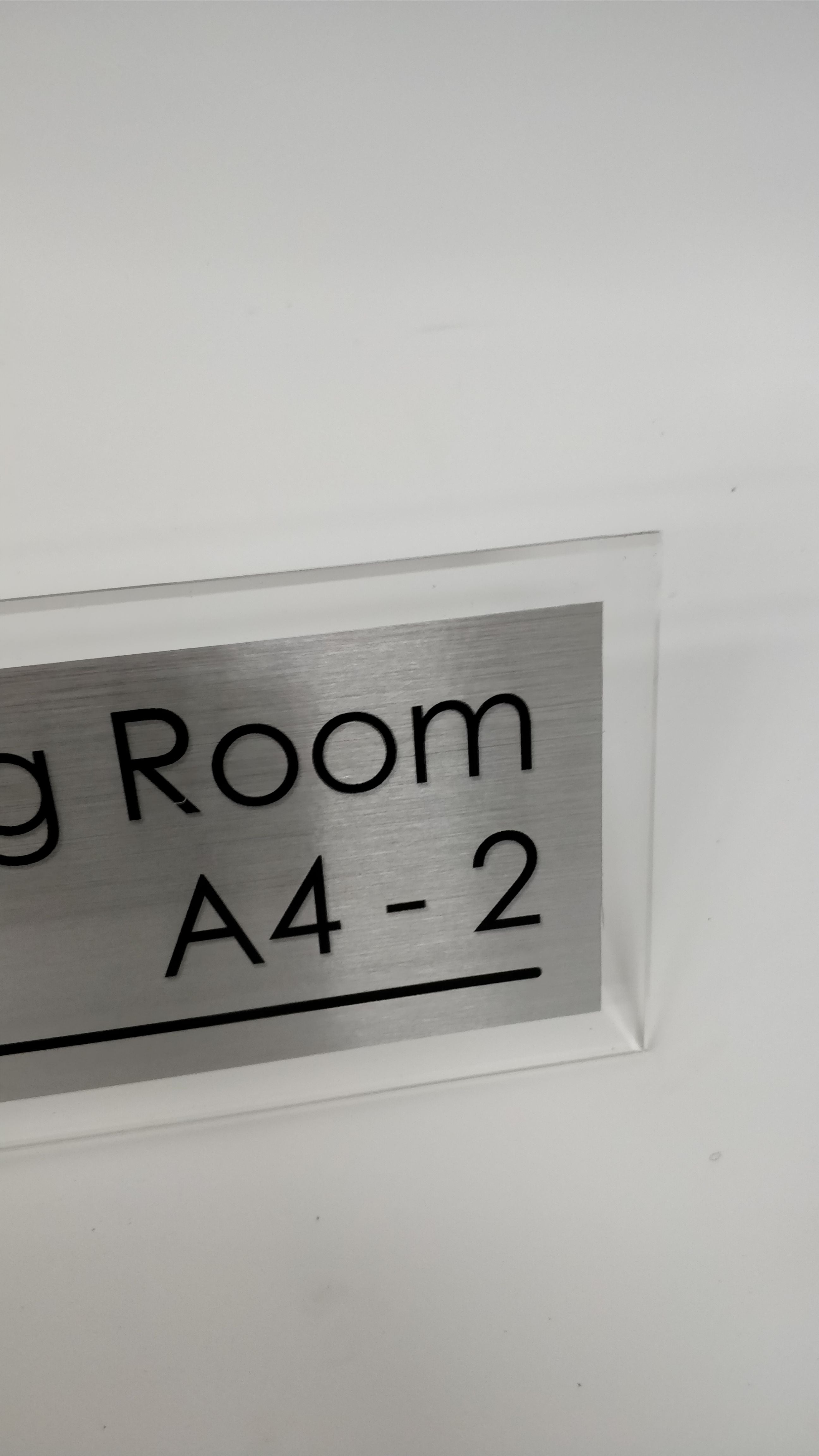 Meeting room metallic texture signage - www.fatherland.com.sg